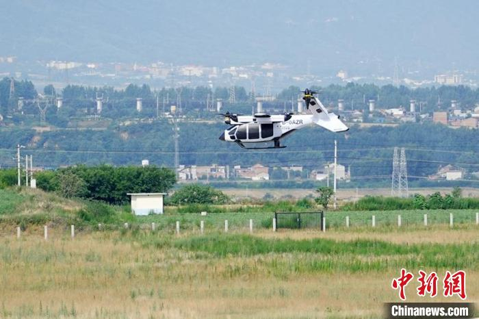 中国自研飞行汽车AE200电动垂直起降航空器首次公开试飞科目__财经头条__新浪财经